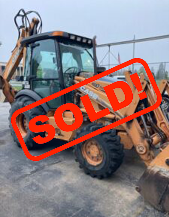 2002 Case 590SM Backhoe loader - yellow and green machinery